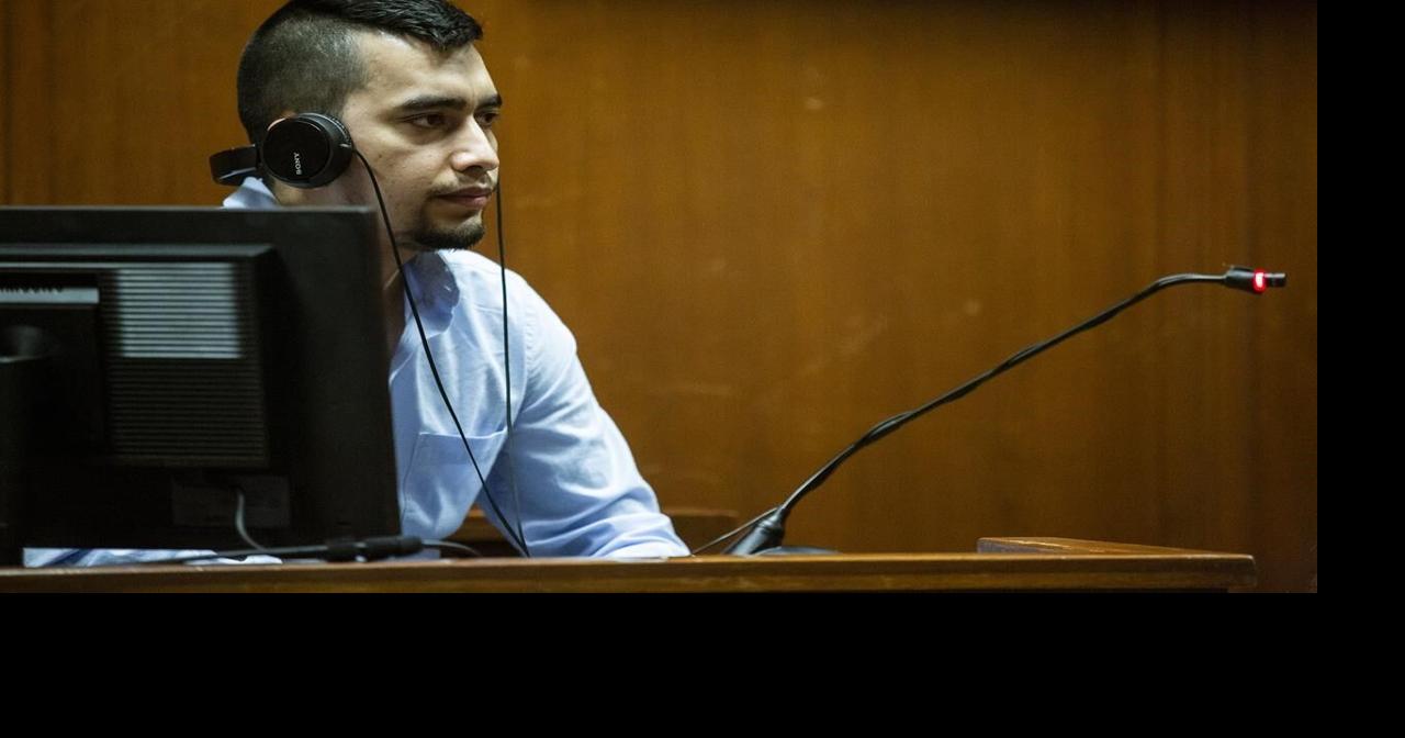 Iowa murder suspect blames mystery men for runner’s slaying