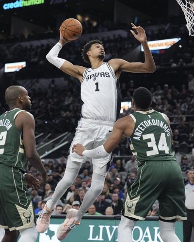 Wembanyama has 30 points, 14 rebounds, 6 blocks to help Spurs beat Antetokounmpo, Bucks, 144-118
