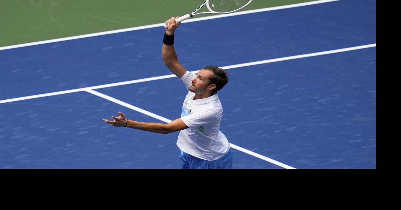 US Open action is delayed when a fire alarm shuts down the electronic ...