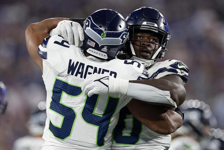 Rookie Devon Witherspoon scores on 97-yard pick-6 as Seahawks' defense leads Seattle over Giants