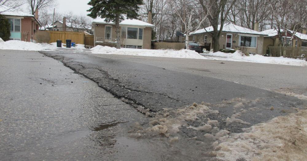 The Fixer: Utility cut patch doubles as speed hump