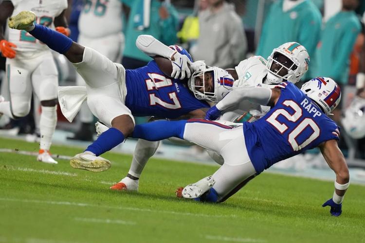 Josh Allen rallies Bills for 21-14 win over Dolphins. Buffalo secures No. 2 seed in AFC