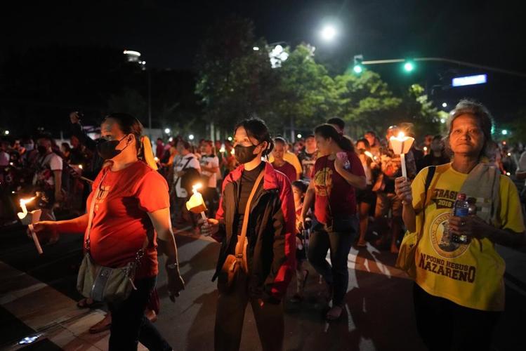 Filipino Catholics hold big procession after pandemic eases