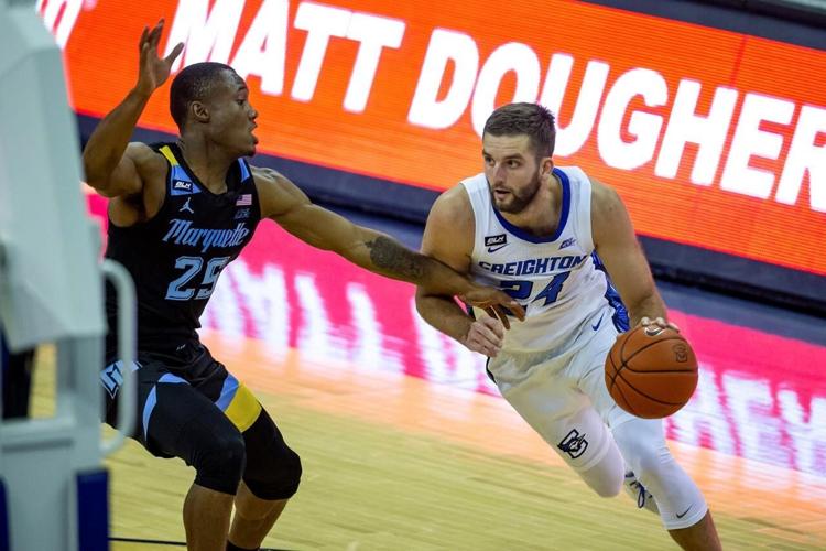 Marquette uses strong 2nd half to beat No. 9 Creighton 89-84