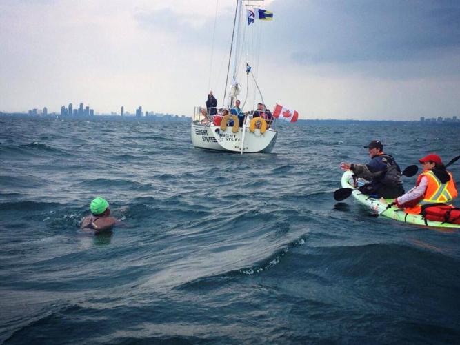 Girl, 14, becomes youngest person to swim across Lake Ontario