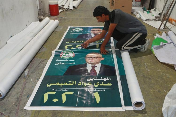 Photos show Iraqis voting in parliamentary election