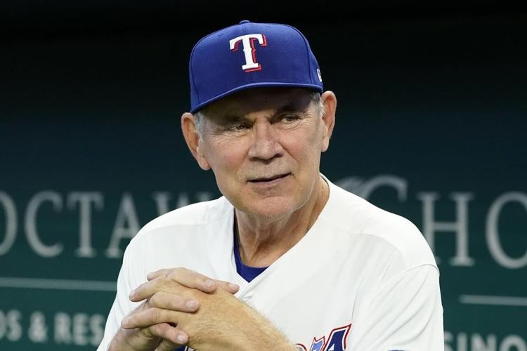 Bochy missed game, takes over Rangers team he beat for title
