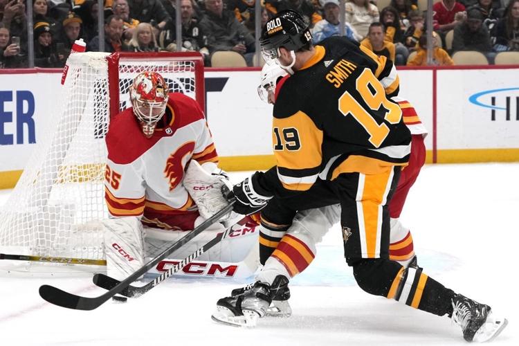 Malkin, Penguins surge past Flames with 5 goals in third for 5-2 win