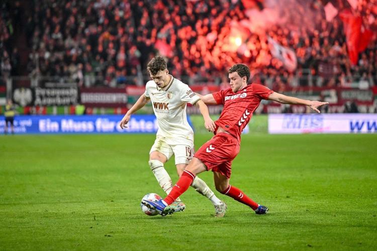 Augsburg beats Cologne to go record-equalling eight straight games ...