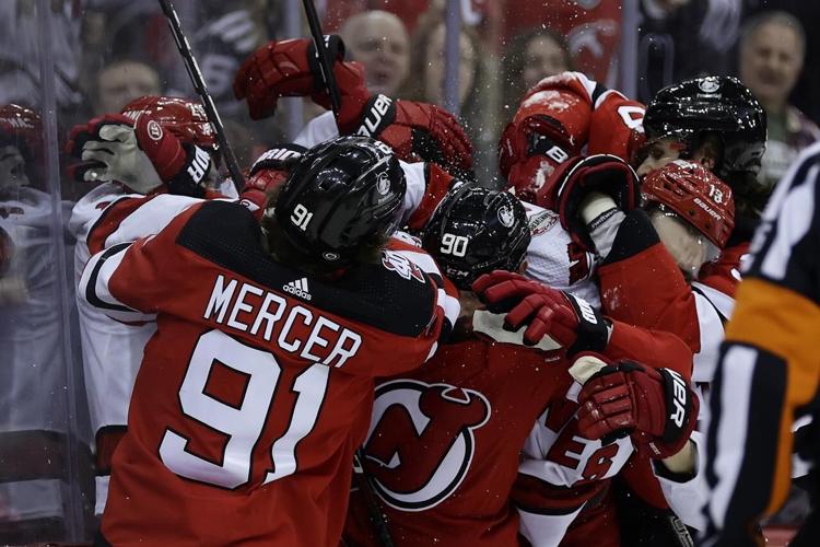 Hughes scores 1, sets up 2 by Bratt, Devils beat Canes 3-0