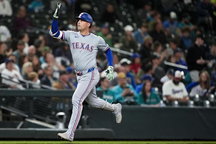 Lowe plates winning run during 3-run 8th and Rangers rally to beat ...