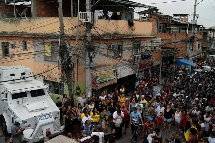 Brazil favela residents protest after 8-year-old shot