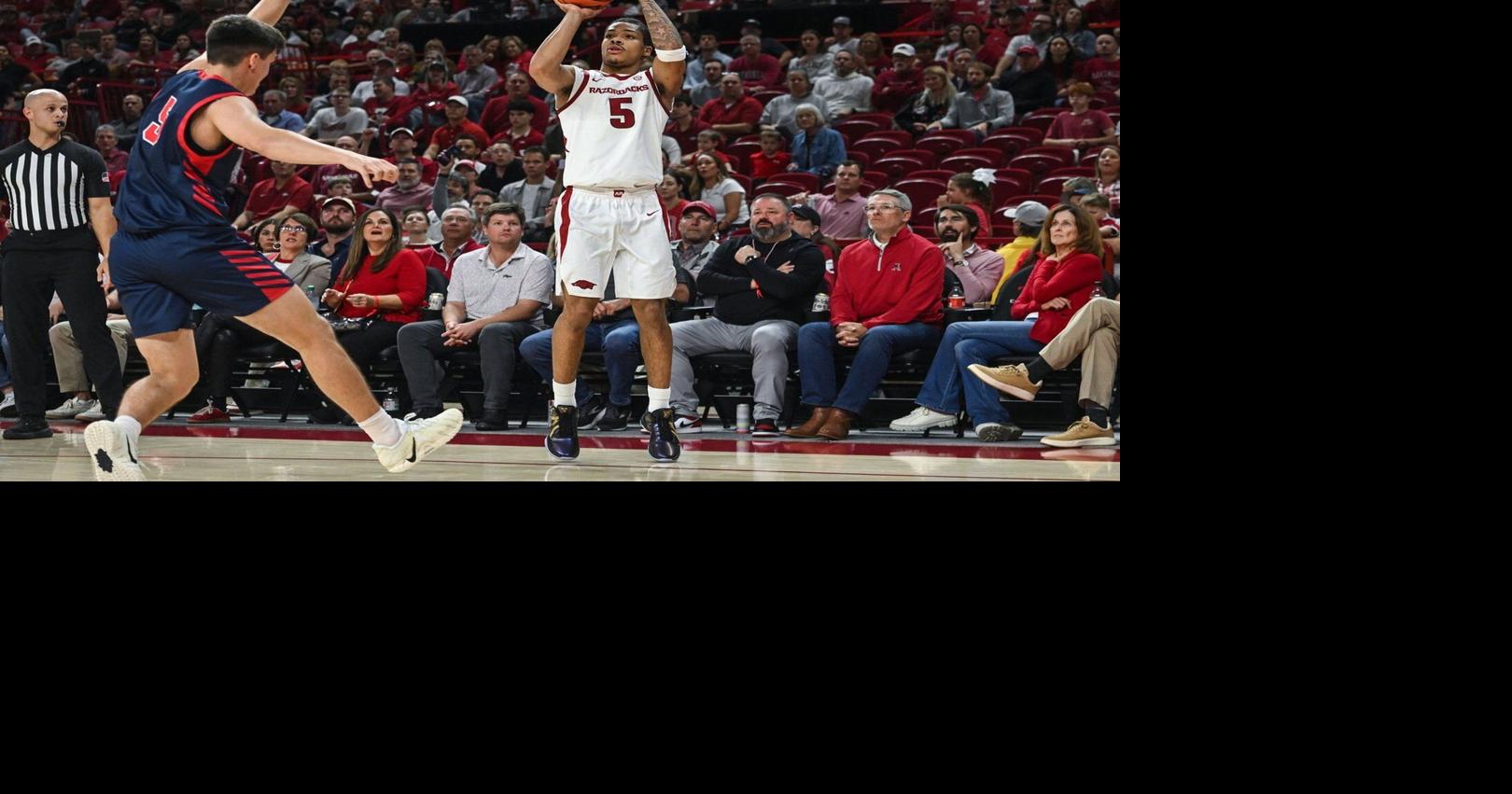 No. 21 Arkansas holds off Samford 79-75 behind freshman guards