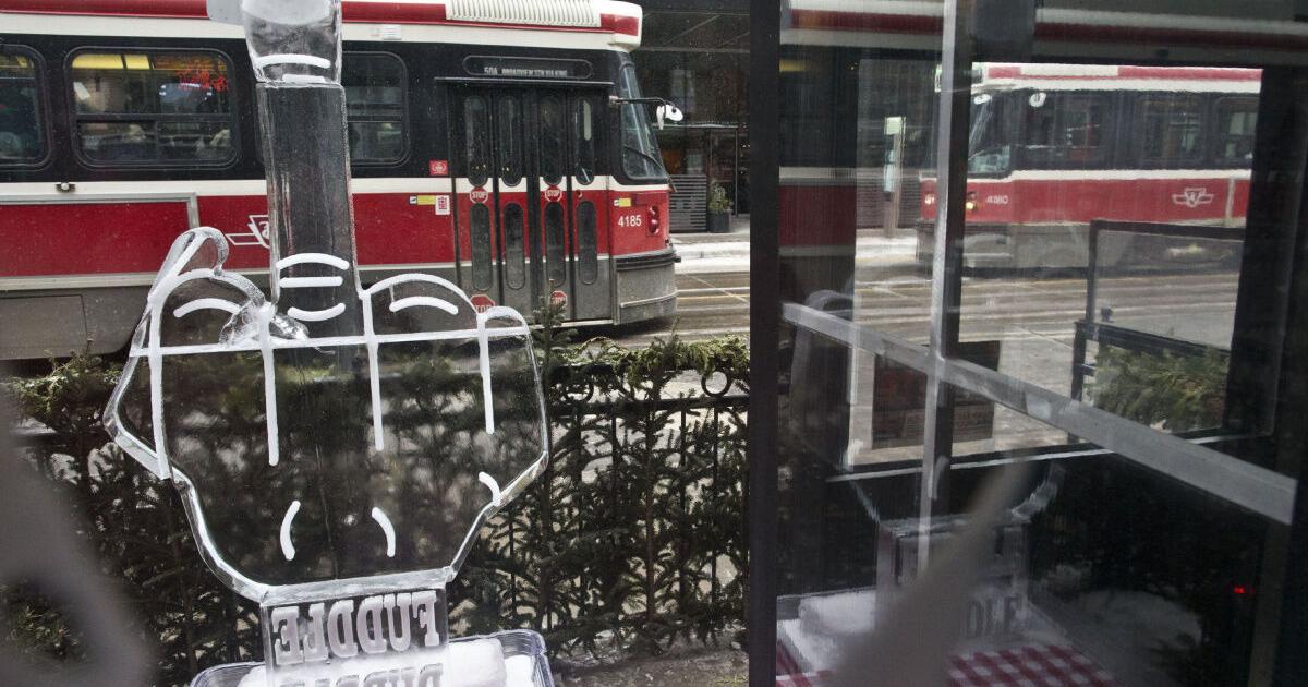 Some businesses give an icy middle finger to King St. pilot