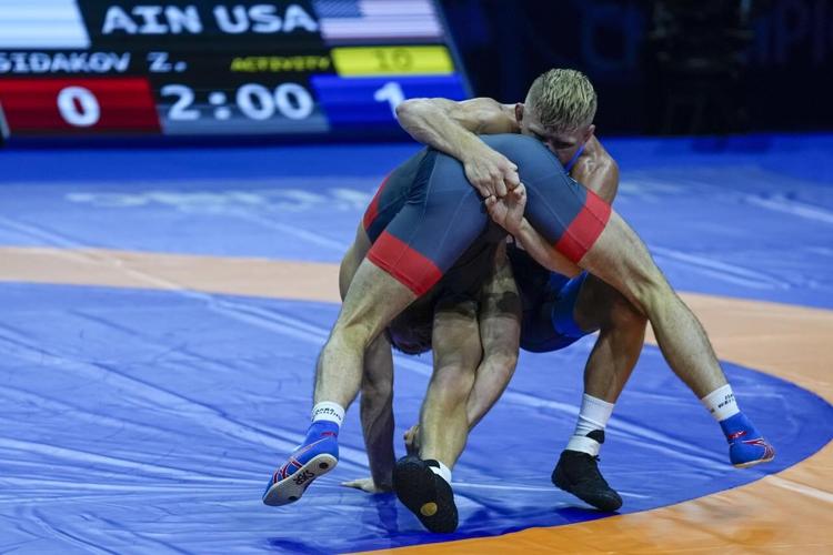 Wrestling body explains why it let Russian champions compete at world ...