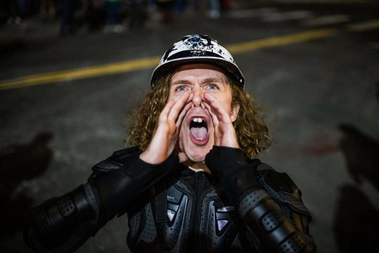 Photos of the mixed reactions to Trump's bid to deploy troops to more ...