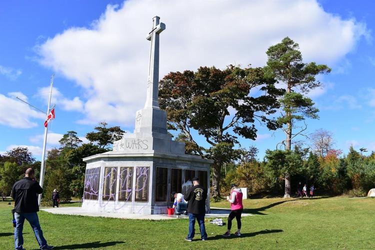Military members gather to clean vandalized Halifax war memorial
