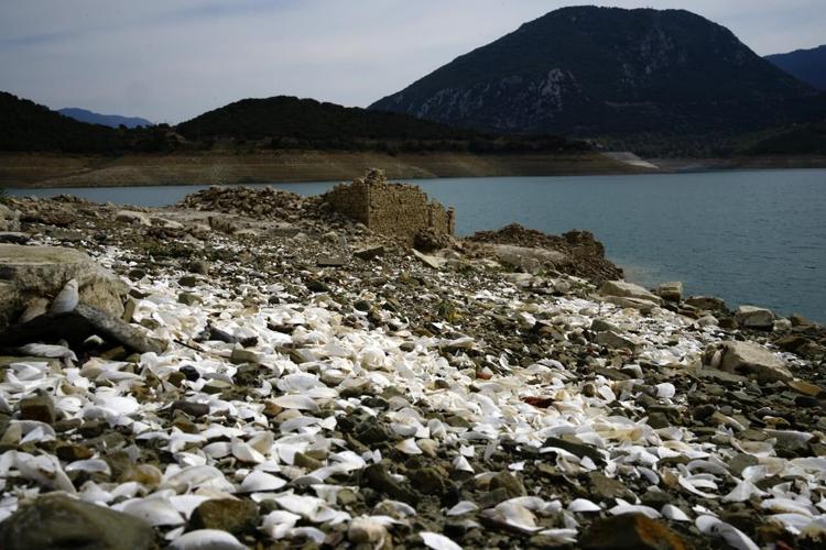 Ruins of a long-sunken Greek village emerge as drought saps a vital ...