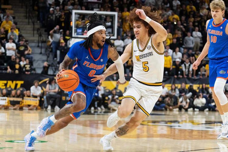 Missouri holds off No. 22 Florida 76-74 in SEC opener