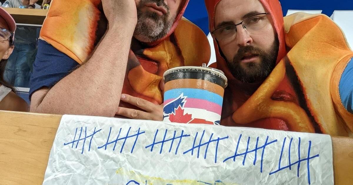 Two Blue Jays fans, 40 hot dogs, and a loonie dog doubleheader