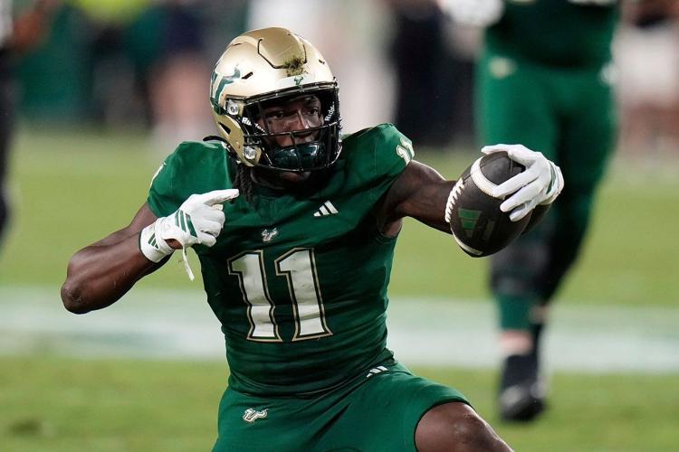 Byrum Brown, No. 19 South Florida run over Florida Atlantic, 48-13