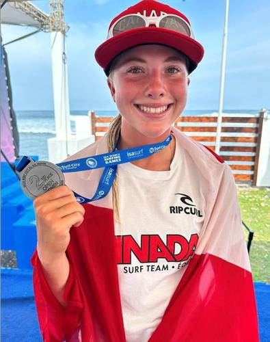 Teenage surfer Erin Brooks making waves, moving up the world surfing ladder