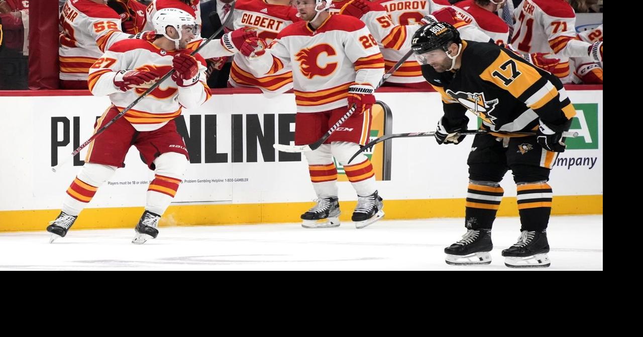 Malkin, Penguins surge past Flames with 5 goals in third for 5-2 win