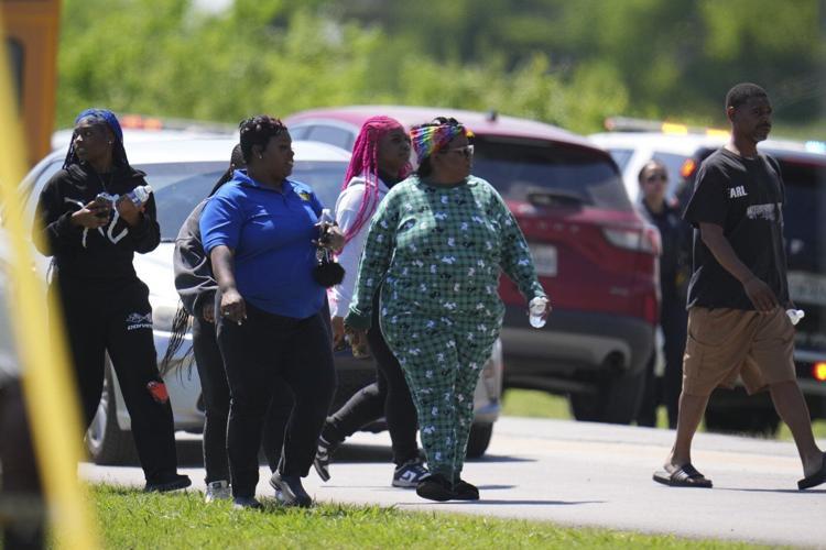 Suspect in shooting at Dallas high school is in custody, officials say