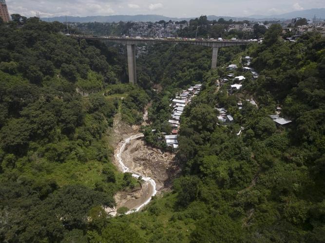 At least 6 people are dead and 12 missing after flash flood in ...