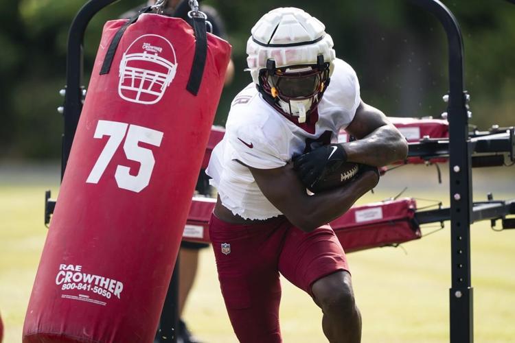 Commanders' Robinson feels 'night and day' a year since being shot in ...