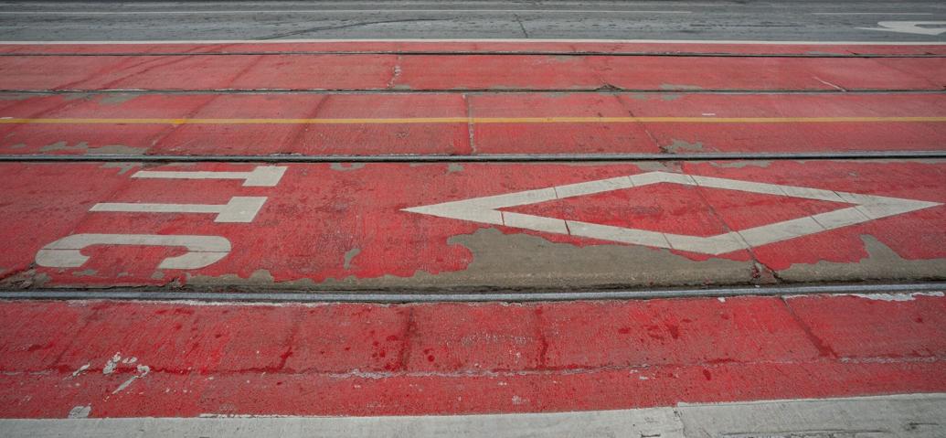 Priority streetcar lane paint peeling weeks after painted