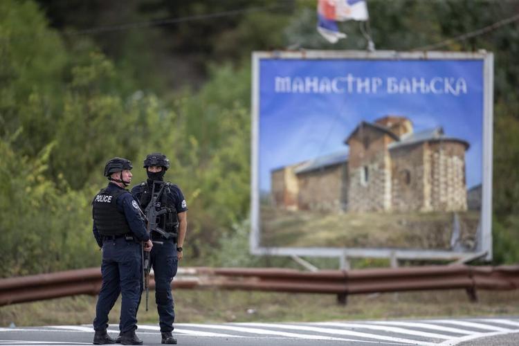 Kosovar police surround a village after Serb gunmen storm a monastery ...