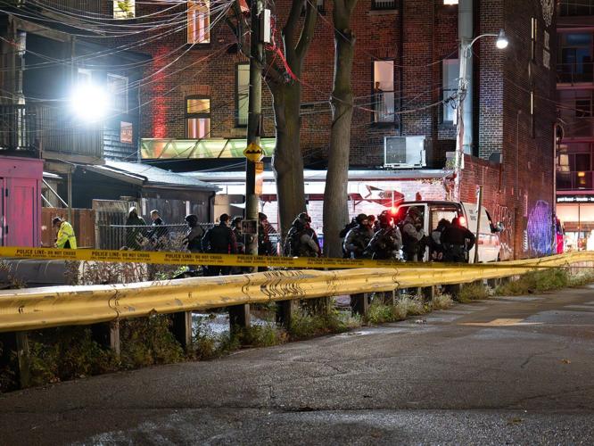 Toronto police lay more charges in Queen St. West shootout