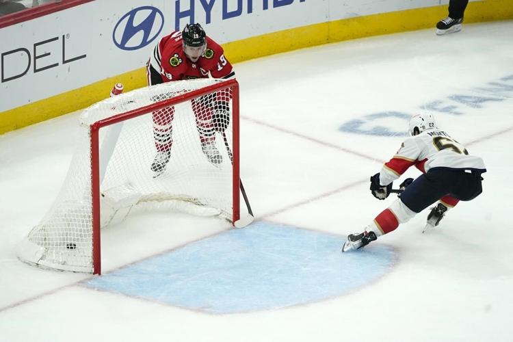 Kane scores, Blackhawks hold off Panthers 4-2 for 4th in row