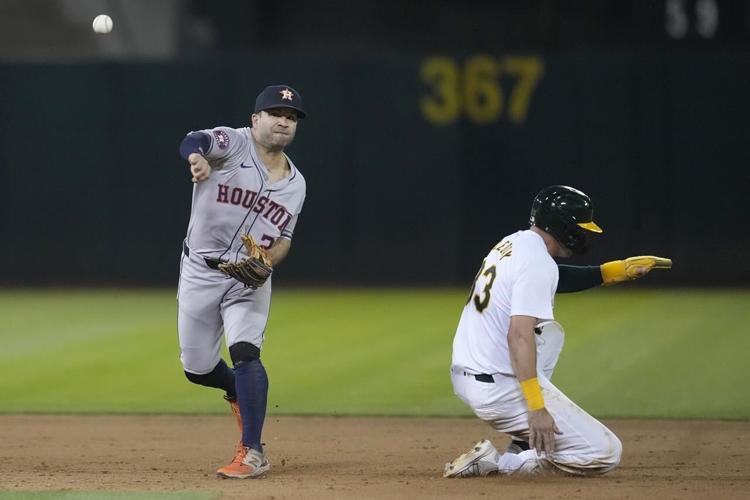 Hogan Harris and 3 Athletics relievers combine to blank Astros 4-0