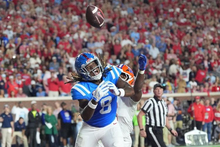 Lacy helps No. 6 Ole Miss rally past Florida for 34-24 win and Rebels ...
