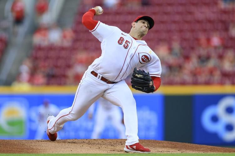 India chopper against 5-man infield lifts Reds over Rockies