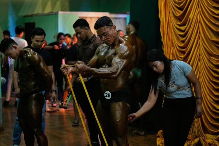 Photos show a bodybuilding competition in Myanmar