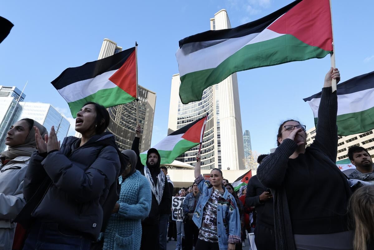 Thousands of protesters take over downtown Toronto streets