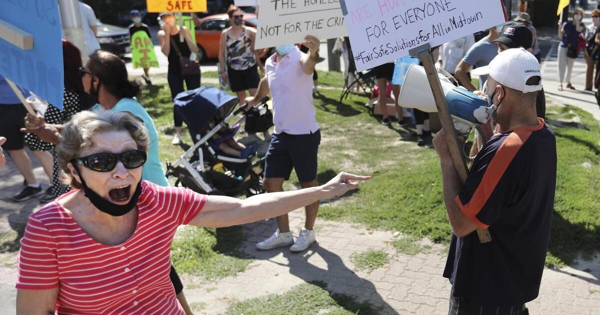 A community divided: protesters face off over homeless shelters in ...