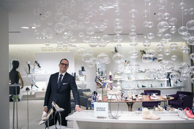 Saks banks on high-end fashion as a lifestyle