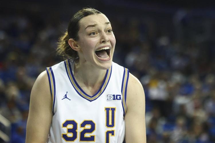 Top-ranked UCLA sets school record with 22nd straight win in 65-52 ...