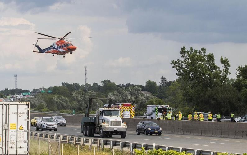 Air ambulance lands on QEW in response to crash