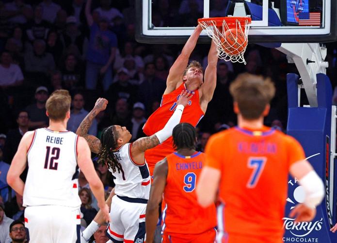 Ball scores 19 points as No. 5 UConn beats No. 18 Florida 77-73 in ...