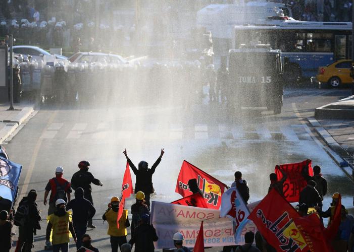 Turkish police crack down on demonstrators on anniversary of anti ...