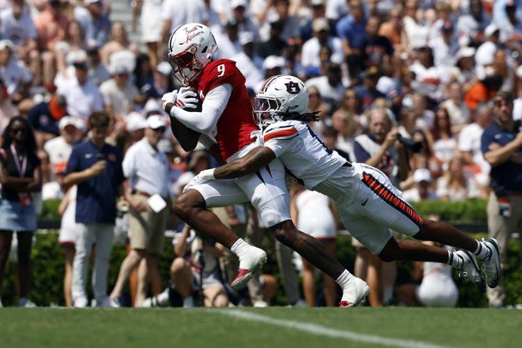 Jackson Arnold accounts for 3 TDs, No. 24 Auburn beats South Alabama 31-15