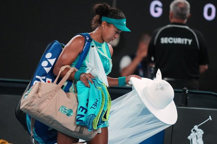 Naomi Osaka tones down her walk-on outfit. Turns up the heat at ...