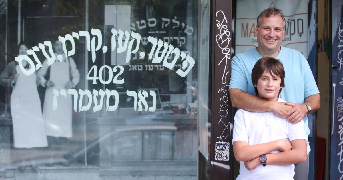 Kensington’s Yiddish Mandel’s sign remounted on College Street