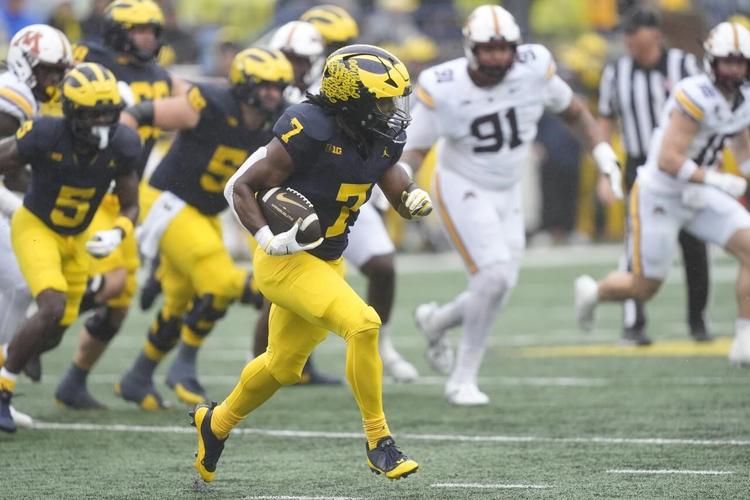 No. 12 Michigan holds off Minnesota in 4th quarter to win 27-24 and ...