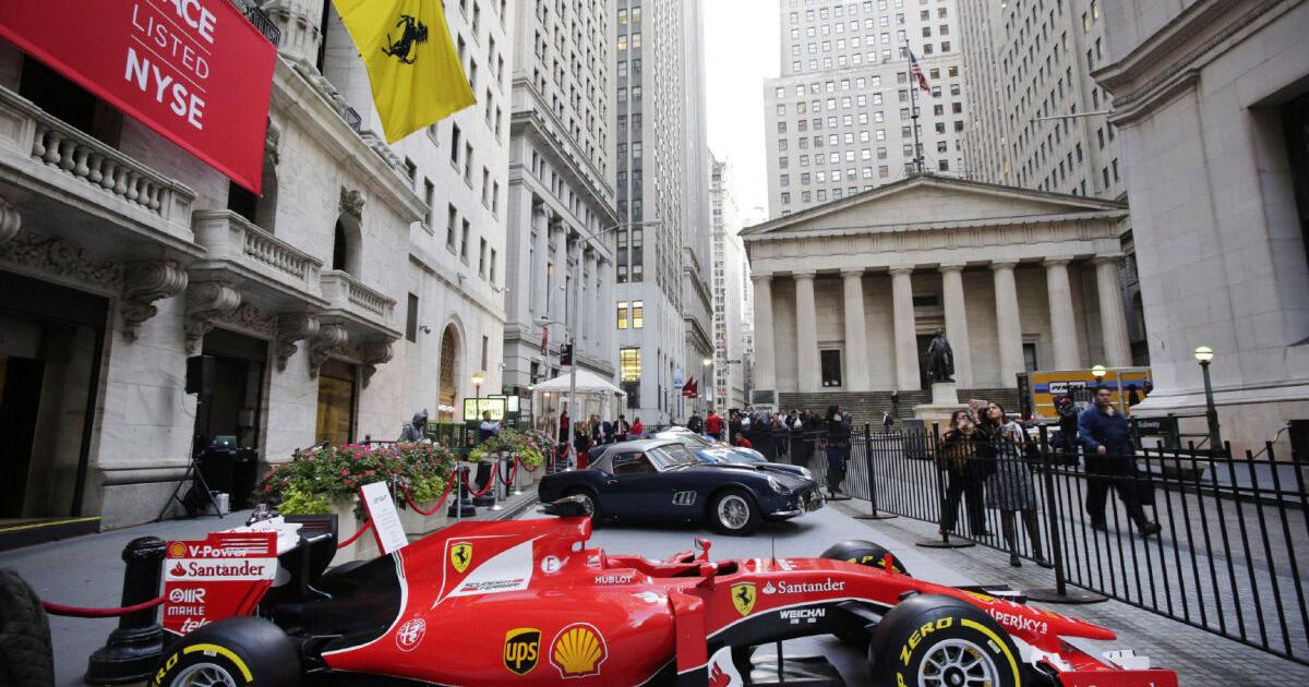 Ferrari shares hit high gear in stock exchange debut
